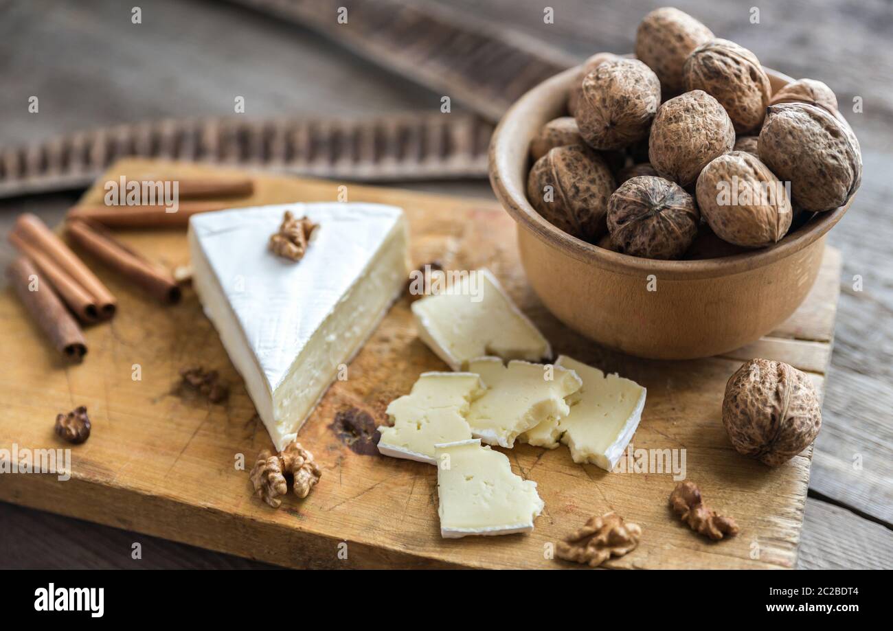 Brie cheese with nuts Stock Photo - Alamy