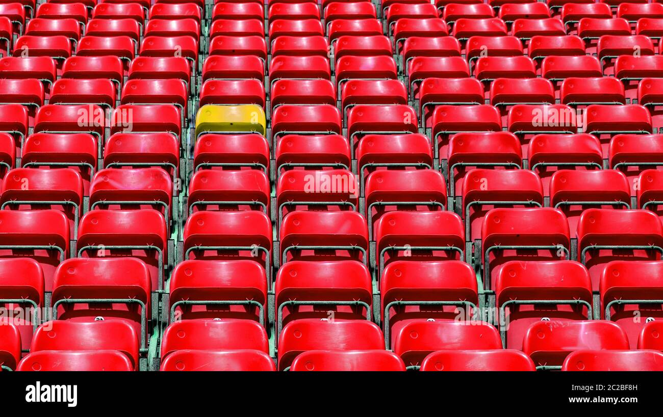Grandstand with seats for fans in the stadium Stock Photo - Alamy