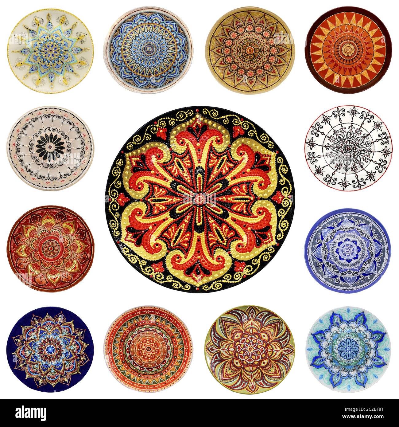 Set of decorative ceramic dishes hand-painted with acrylic paints ...