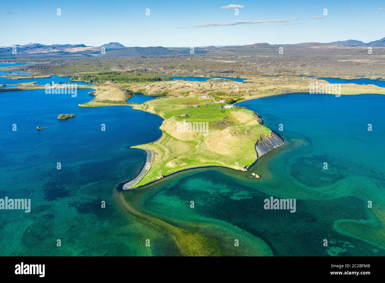 Landscape of Lake Myvatn with green pseudocraters and islands at ...
