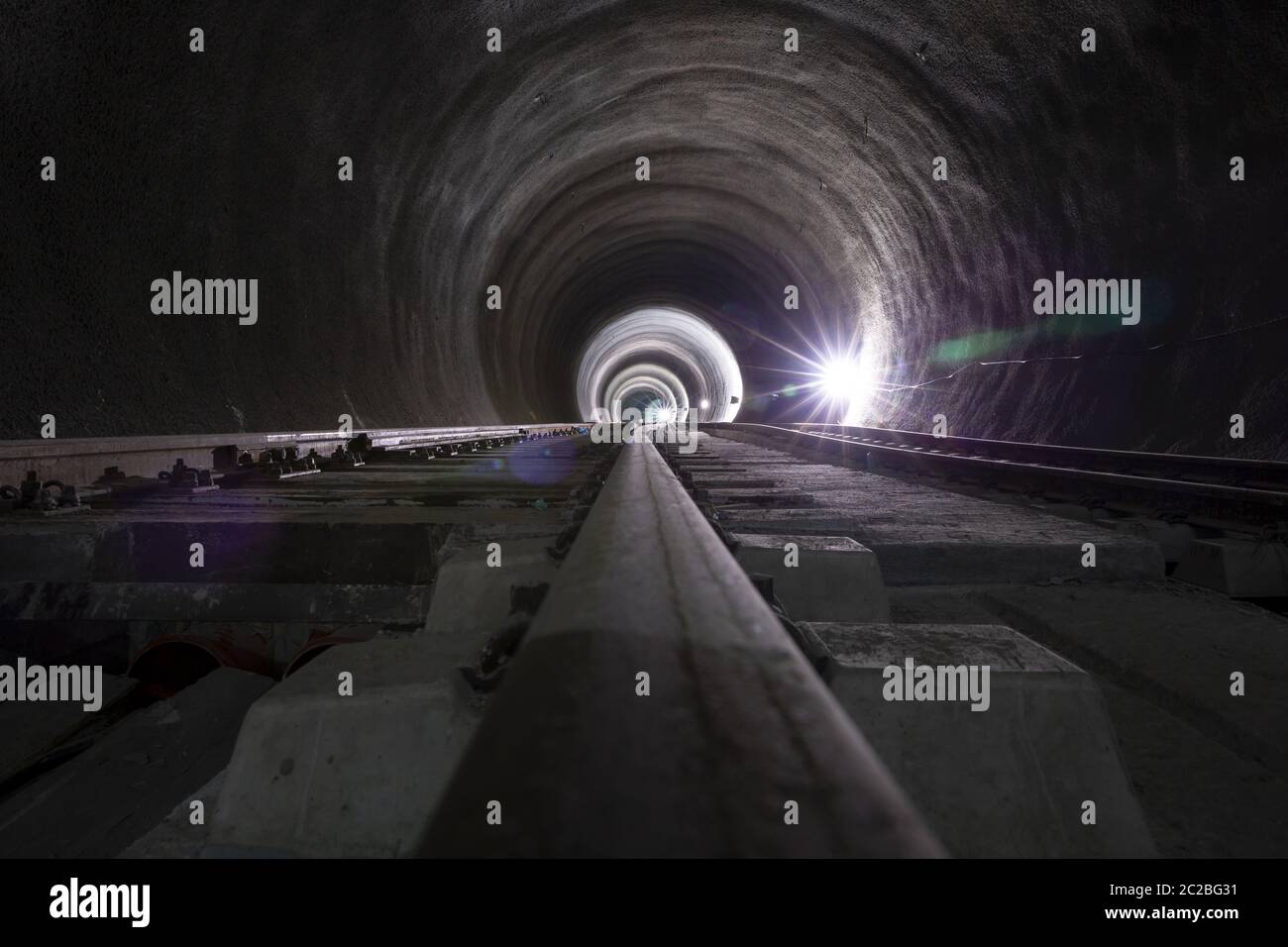 Underground tunnel rails Stock Photo - Alamy