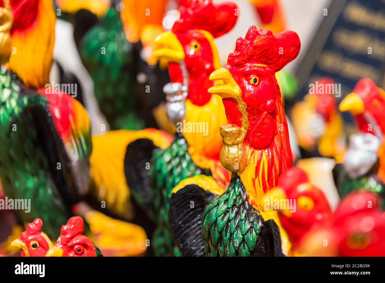 Chicken statue for worship at the temple Stock Photo - Alamy