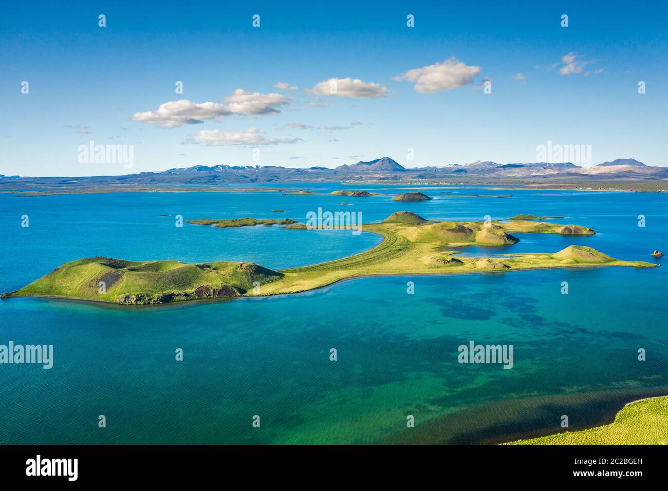 Landscape of Lake Myvatn with green pseudocraters and islands at ...