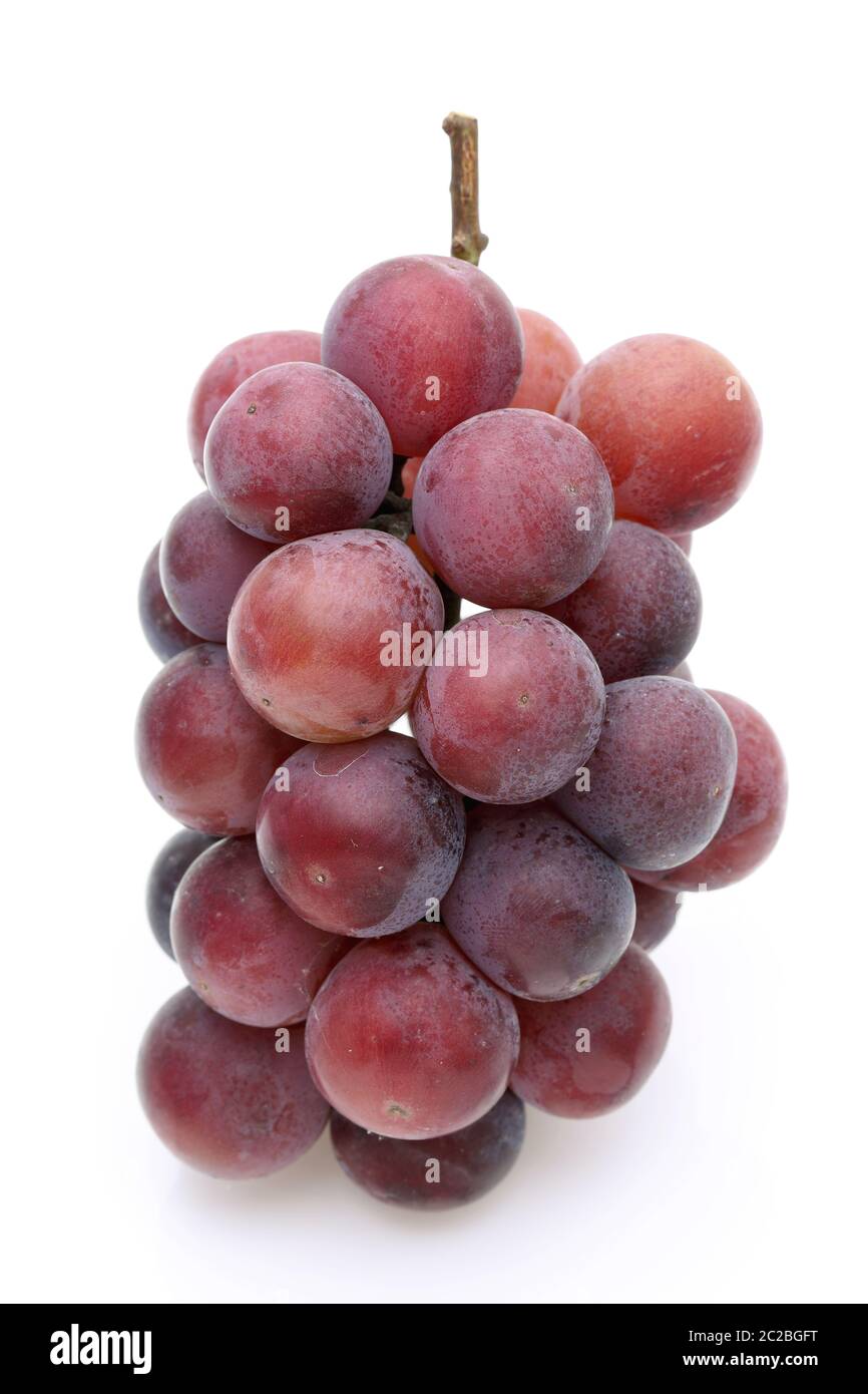 bunch of ripe red grapes isolated on white background Stock Photo - Alamy