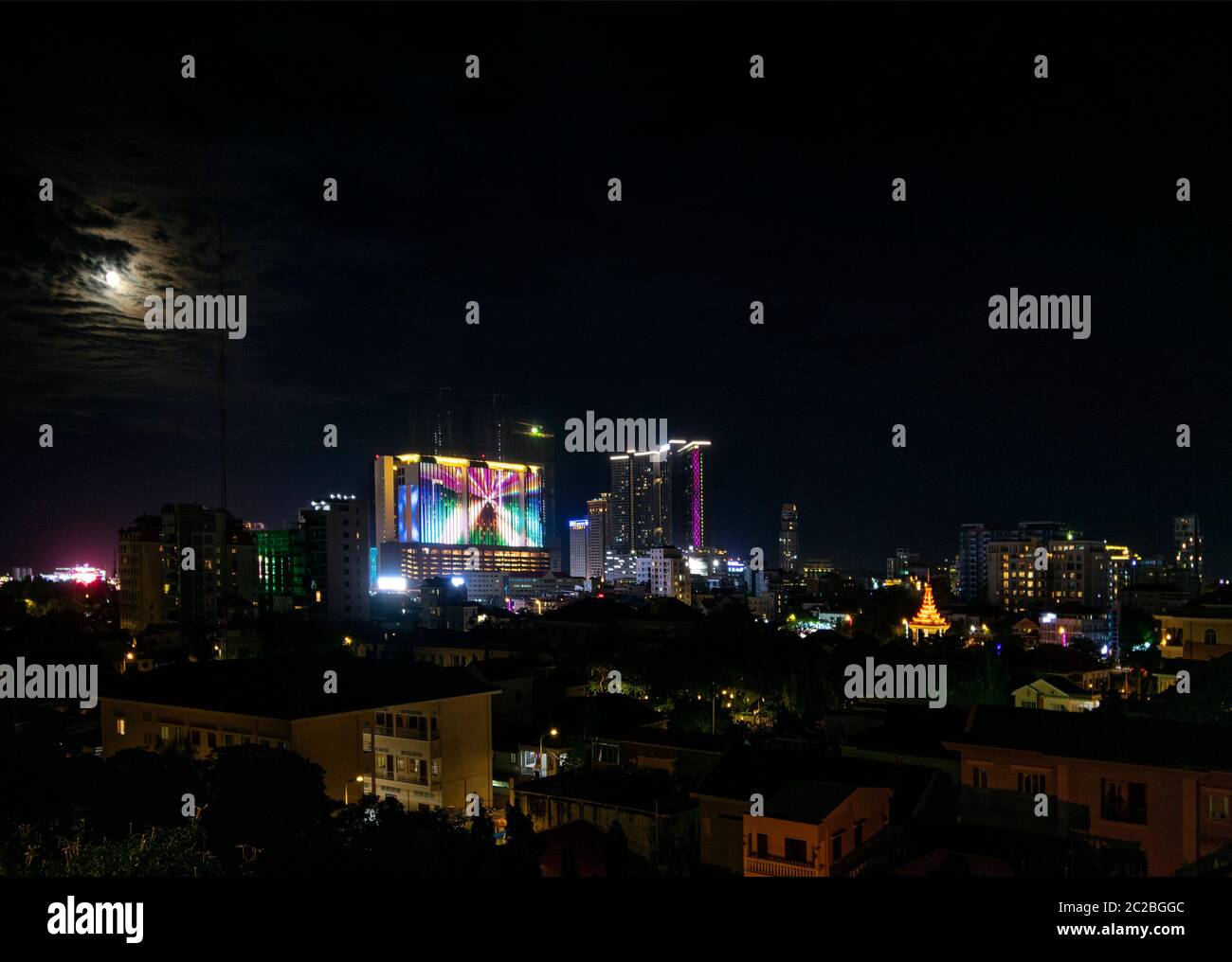 downtown central phnom penh city night view in cambodia with Naga World ...