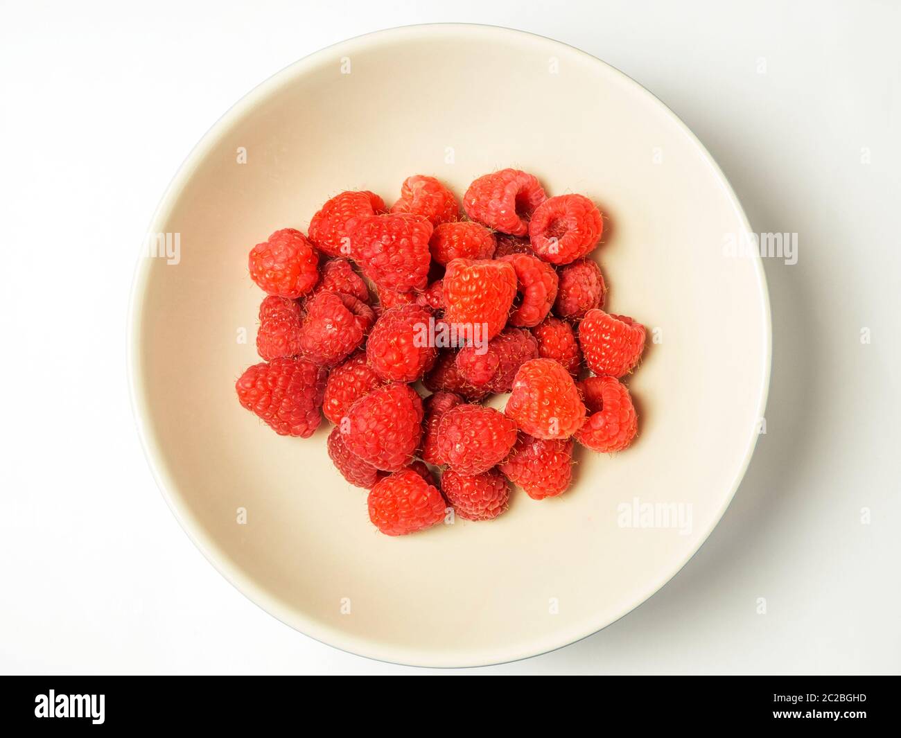 Raspberries in a white bowl hi-res stock photography and images - Alamy