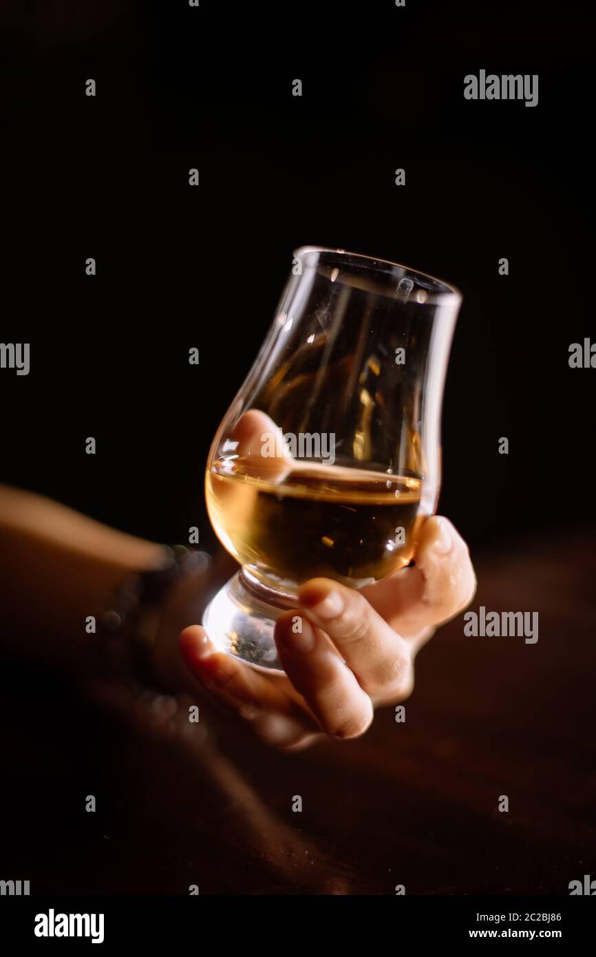 Hand grabbing a glass hi-res stock photography and images - Alamy