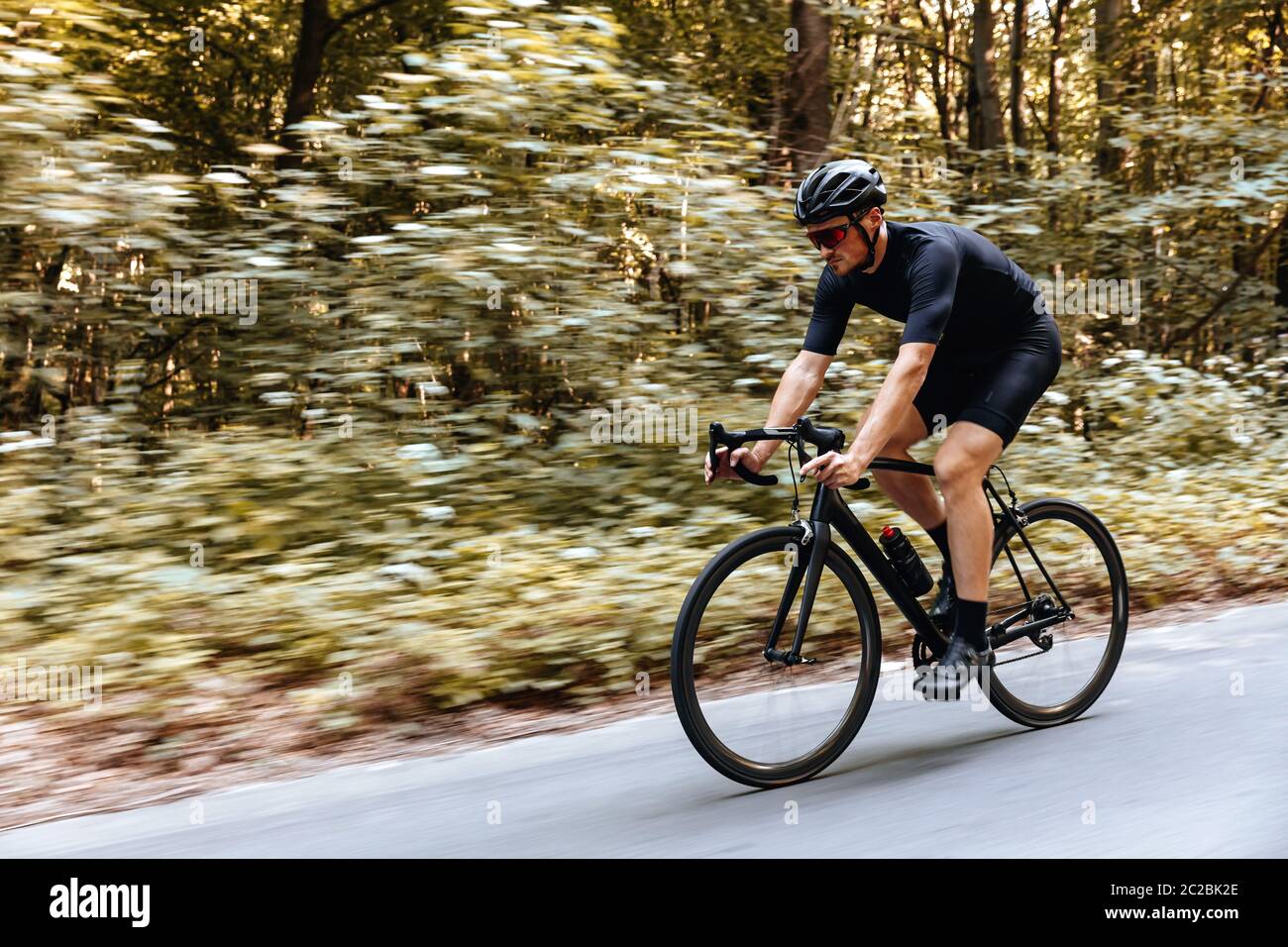 Motion blur cyclist hi-res stock photography and images - Alamy
