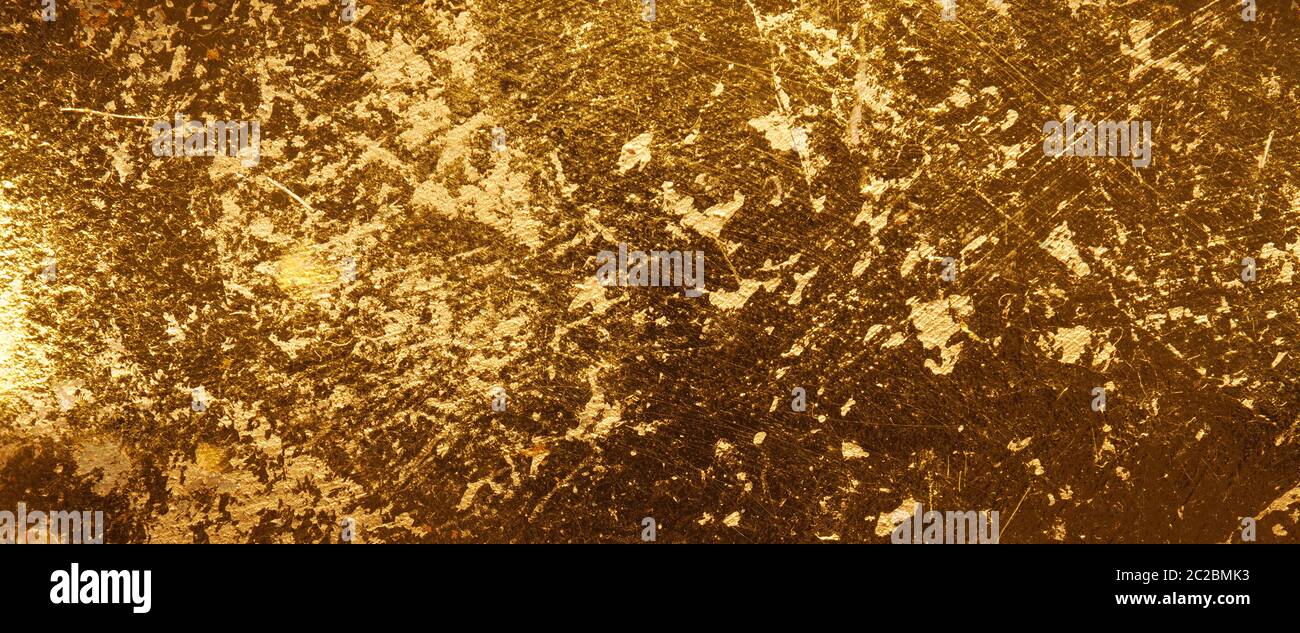 In gold painted wood texture using as luxury or festive background ...