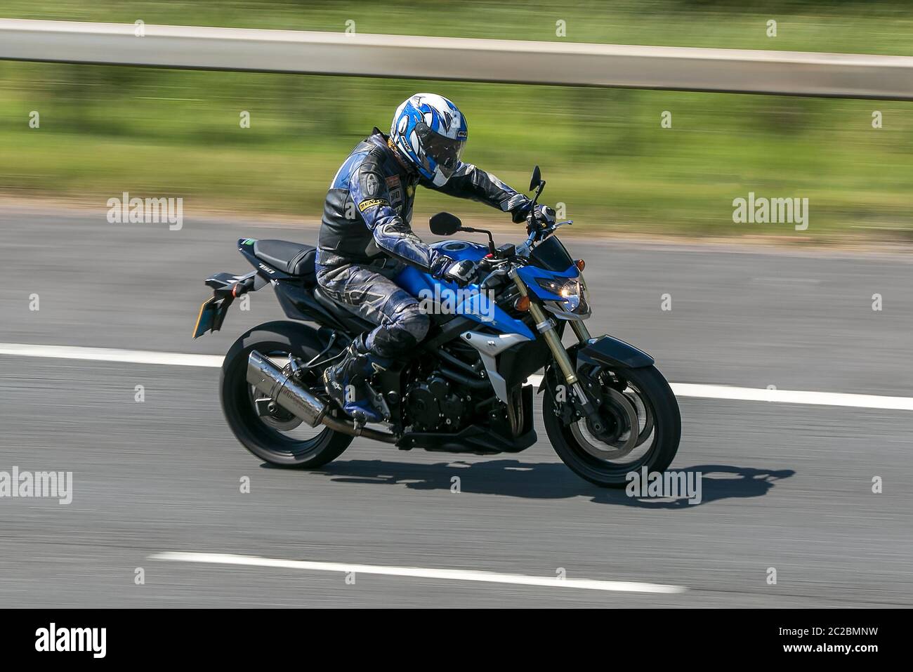 Suzuki GSR Motorbike rider; two wheeled transport, motorcycles, vehicle ...