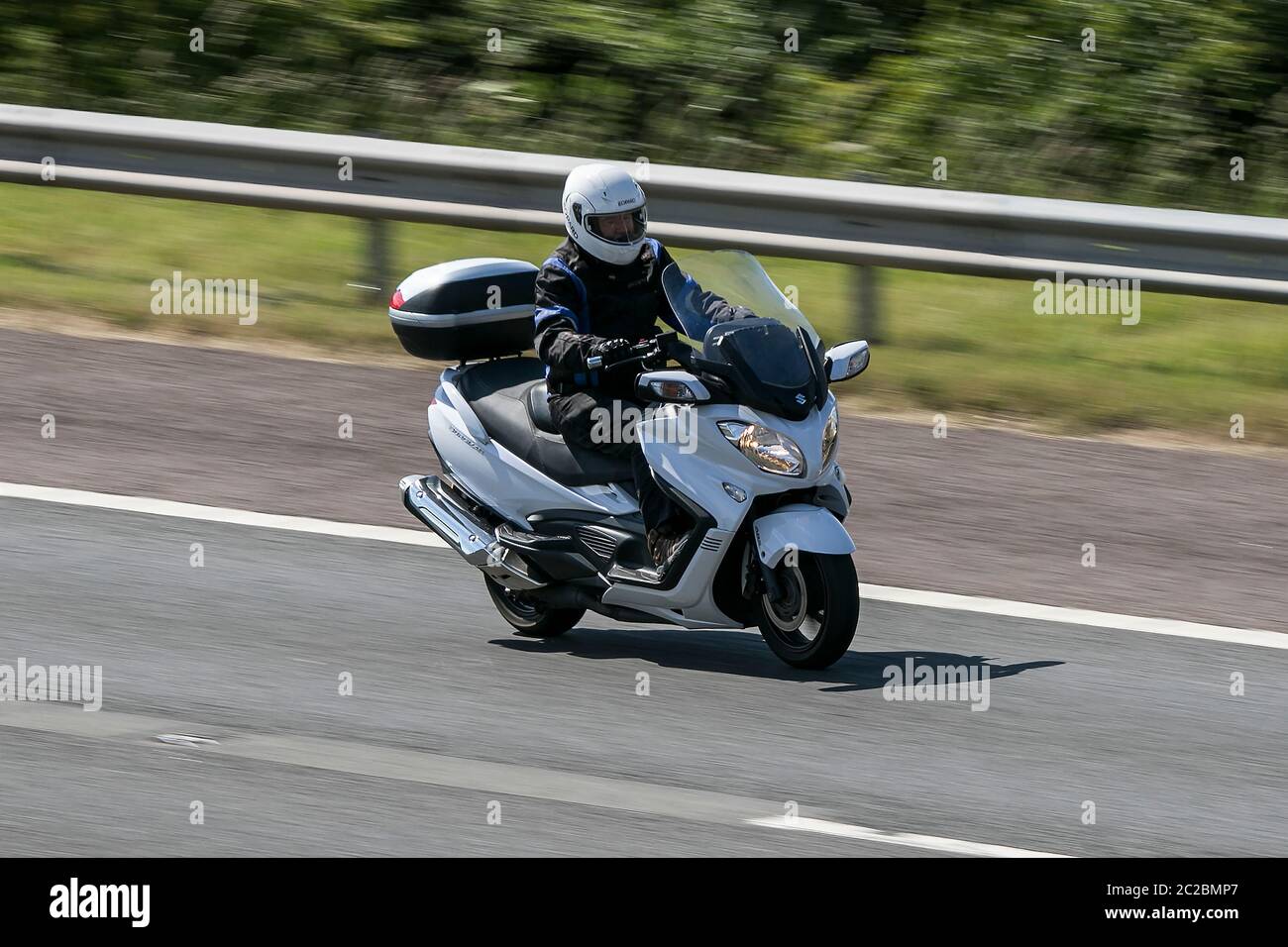 Suzuki Motorbike rider; two wheeled transport, motorcycles, vehicle ...