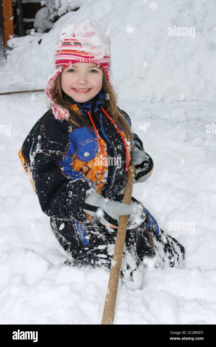 Girl snow hi-res stock photography and images - Alamy