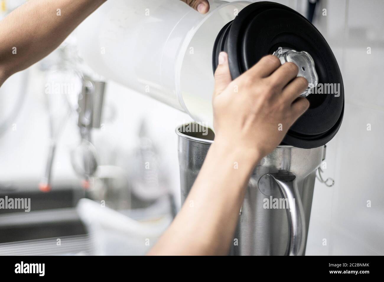 making gelato ice cream with modern professional equipment preparation ...