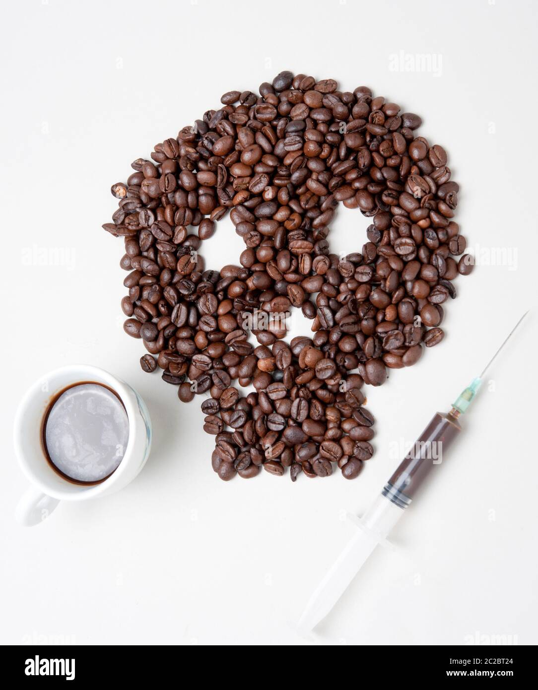 caffein addiction concept. Coffee beans in the shape of a skull and a ...
