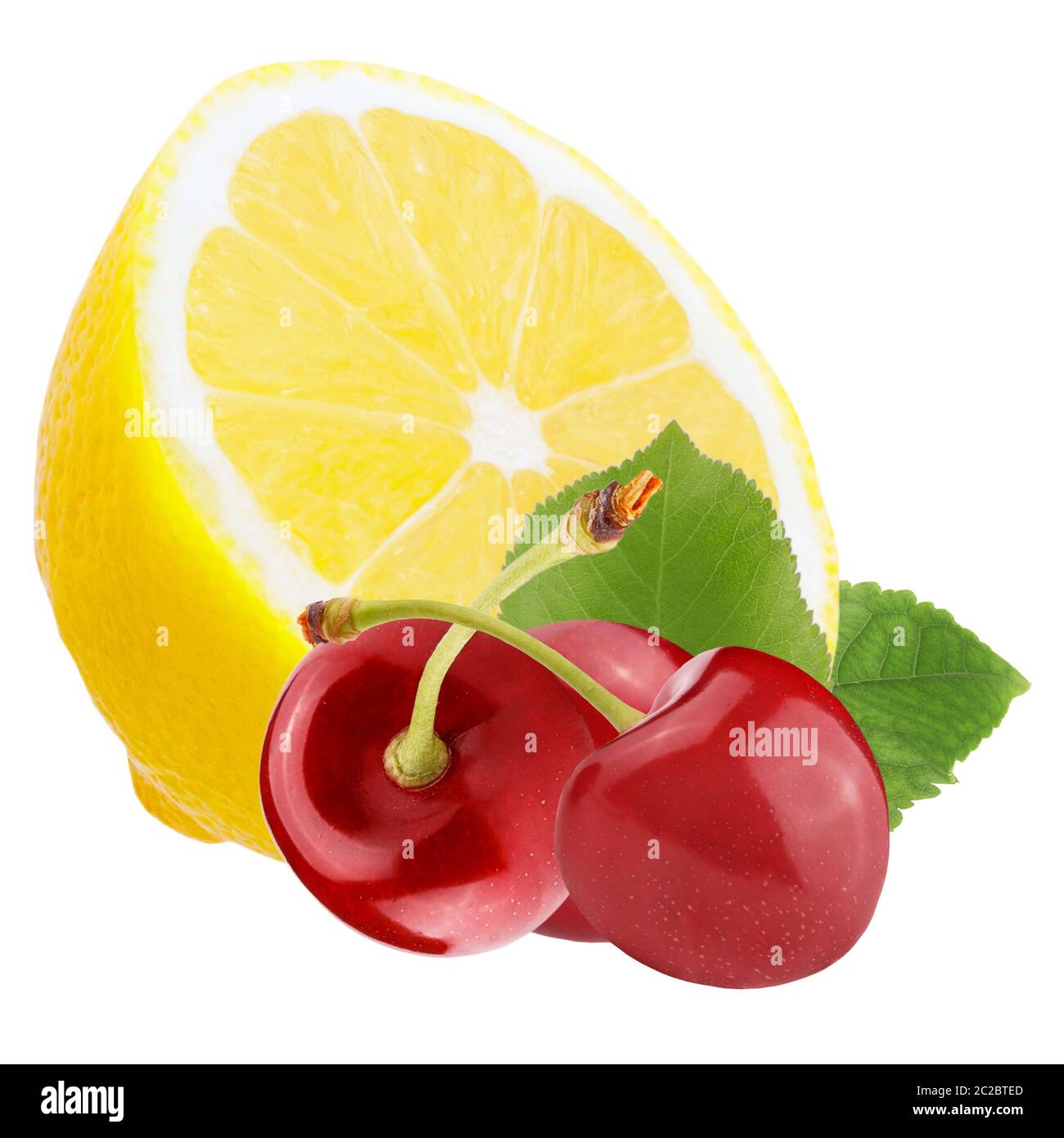 Isolated fruits. Half of lemon and cherries isolated on white ...