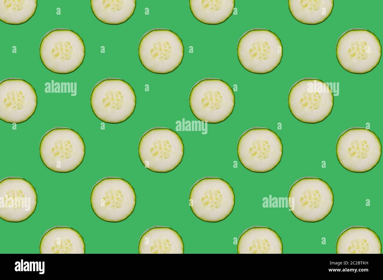 Food pattern. Cucumbers texture on green pastel background. From top ...