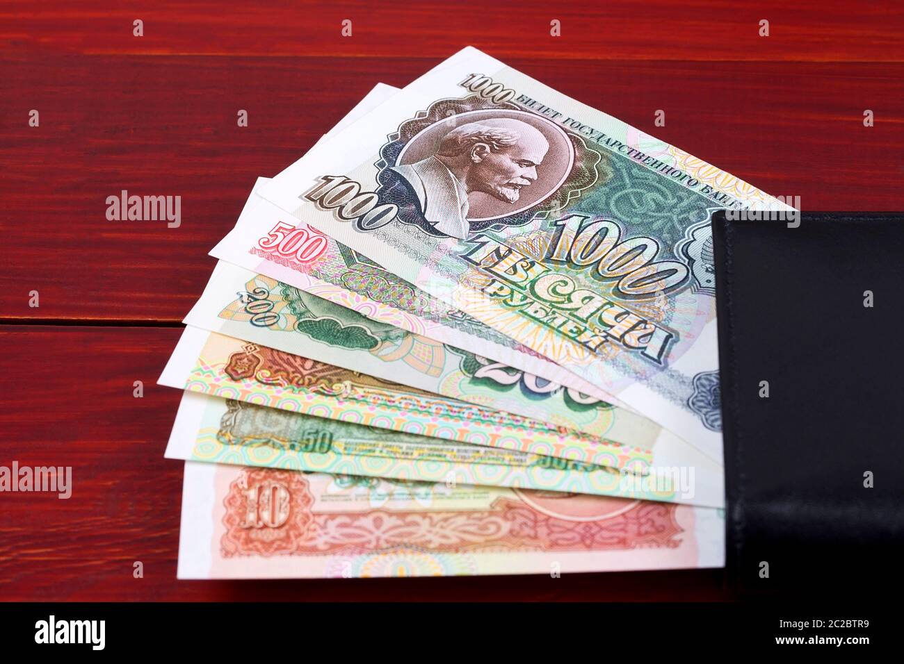Old Russian ruble in the black wallet Stock Photo - Alamy