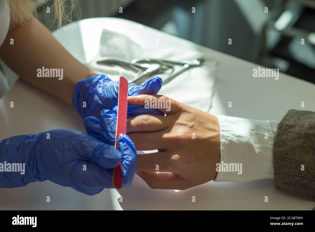 Close-up of male manicure for a man of thirty years. The beauty of male ...