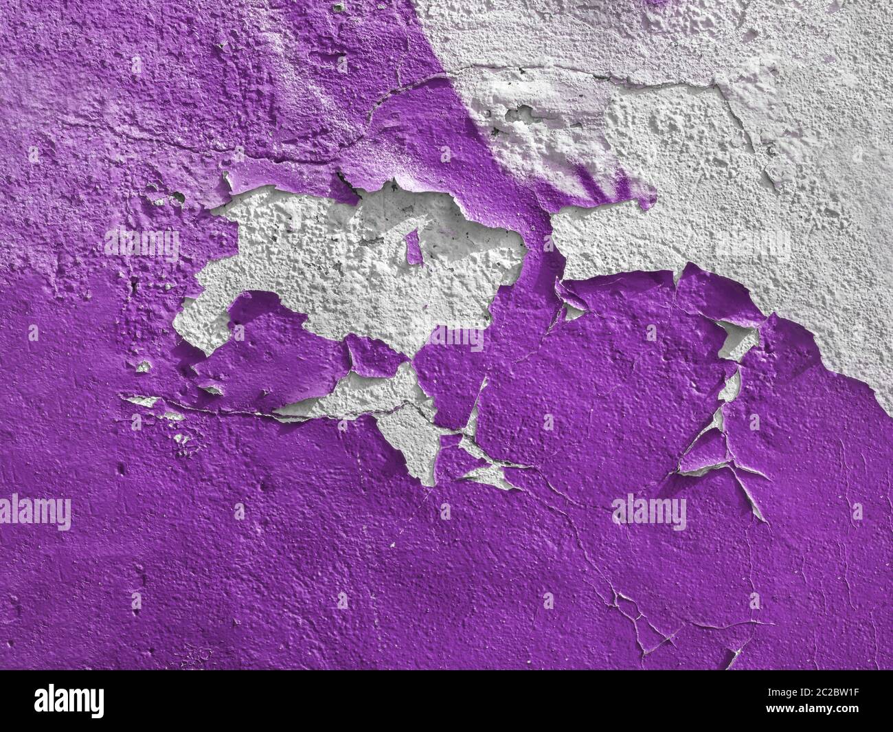 Violet wall with the peeled-off paint. It can be used as background ...