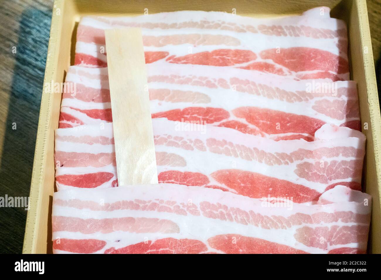 premium japanese raw pork meat set with blank label ready to cook Shabu ...