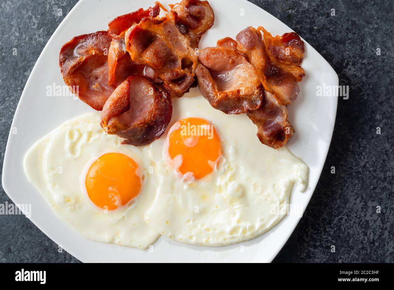 close up of bacon and eggs breakfast Stock Photo - Alamy