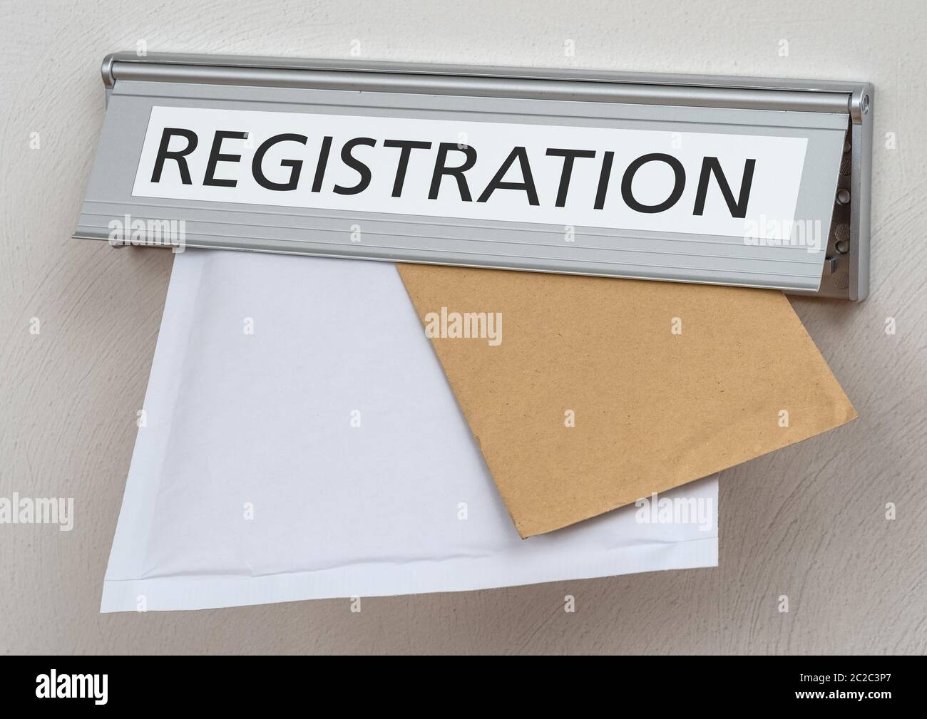 A letterbox with the label Registration Stock Photo - Alamy