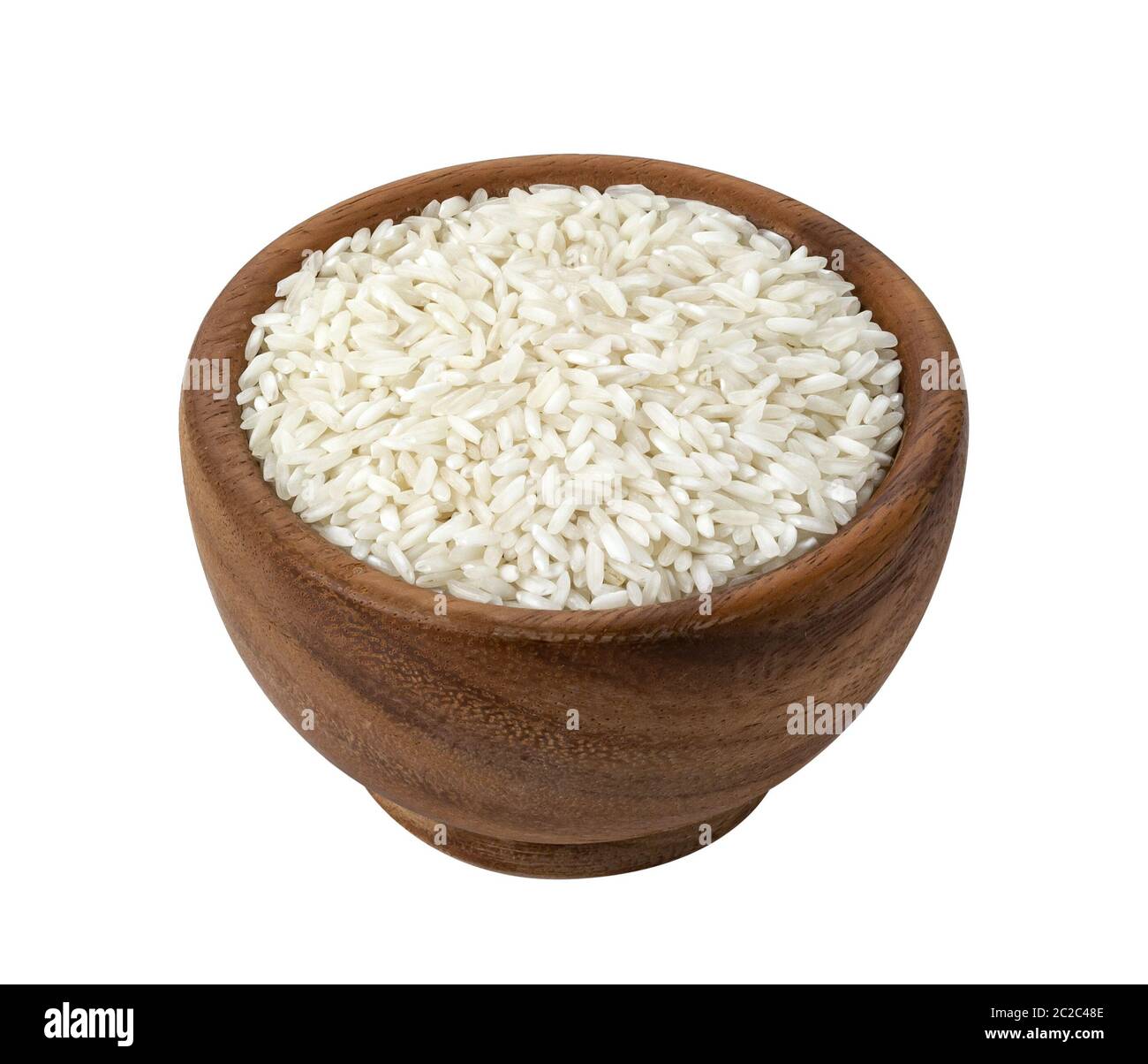 Brown wooden bowl with dry uncooked rice grain Stock Photo - Alamy