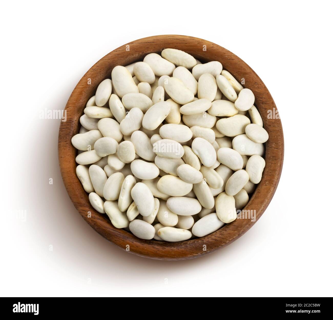 White beans in wooden bowl isolated on white background Stock Photo - Alamy