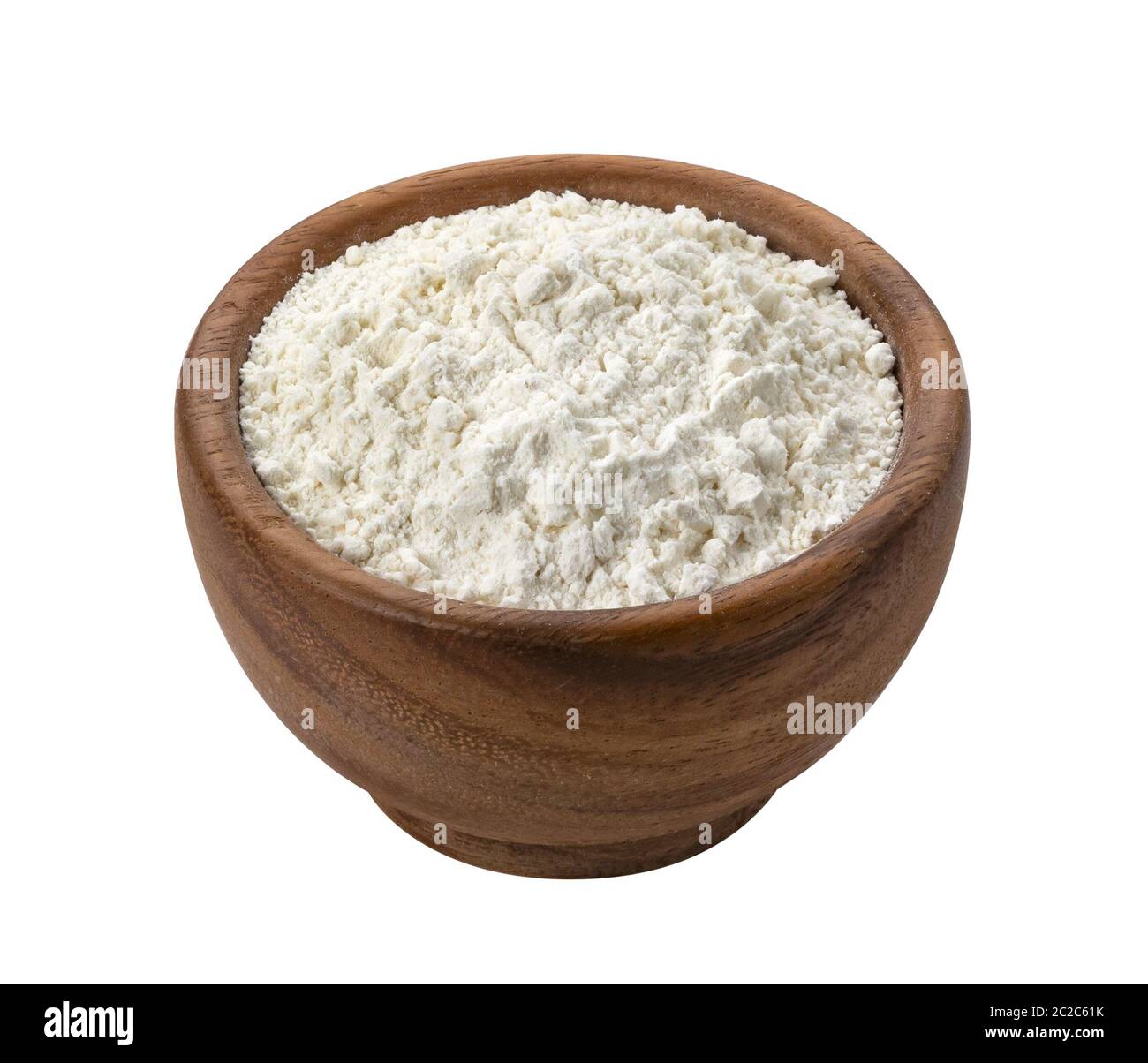 Brown wooden bowl with dry flour powder isolated on white background ...