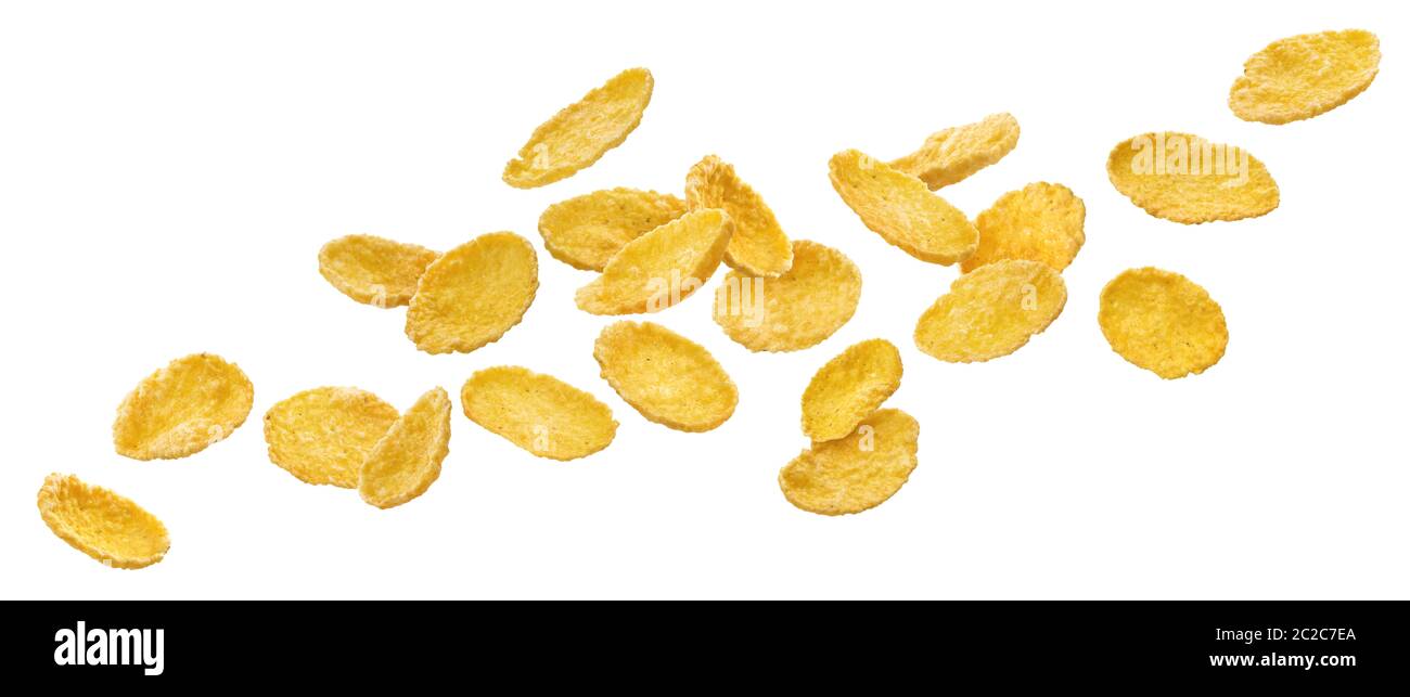 Falling corn flakes, traditional breakfast cereal isolated on white ...