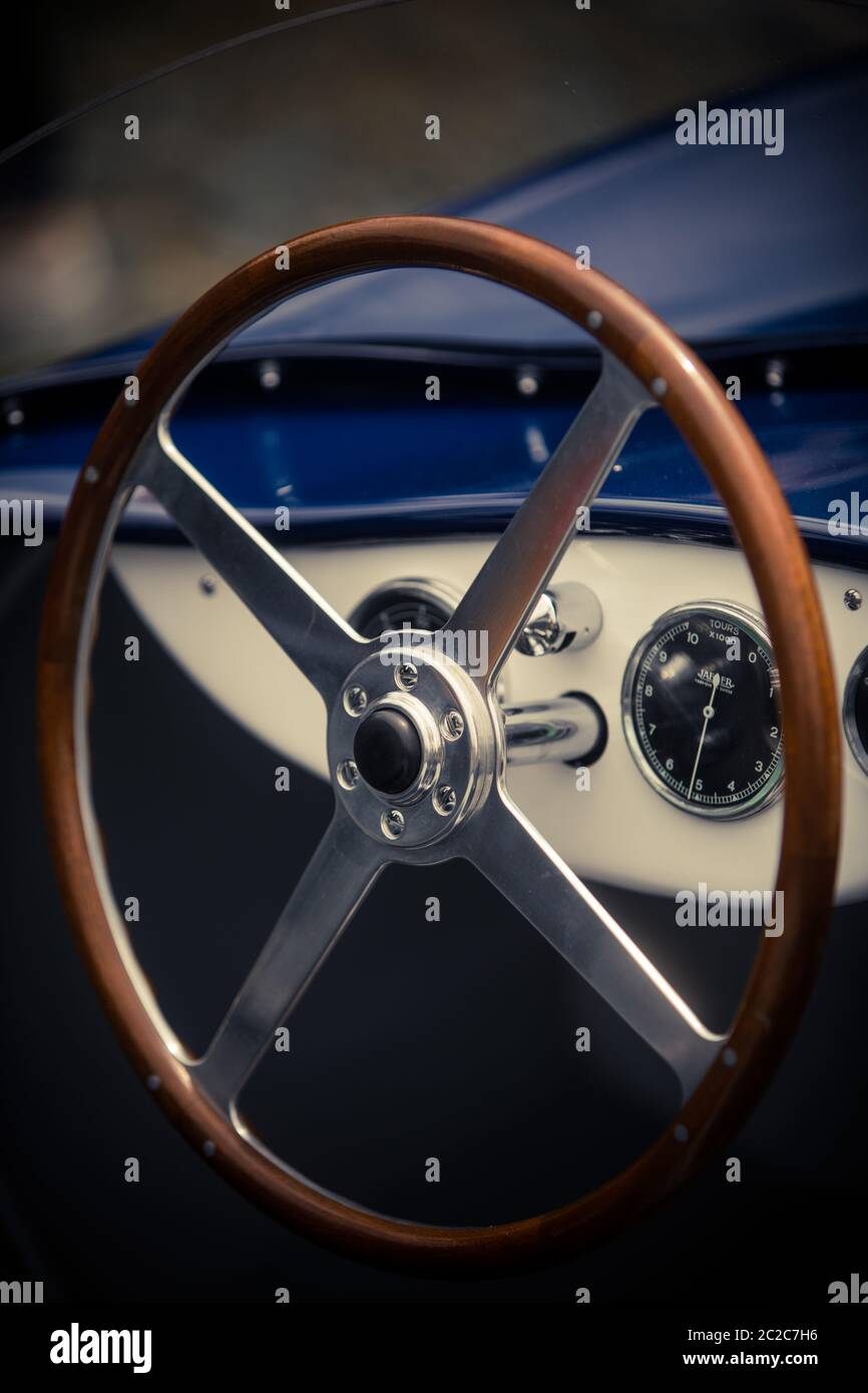 Color close up of the wooden steering wheel of an old classic car Stock ...