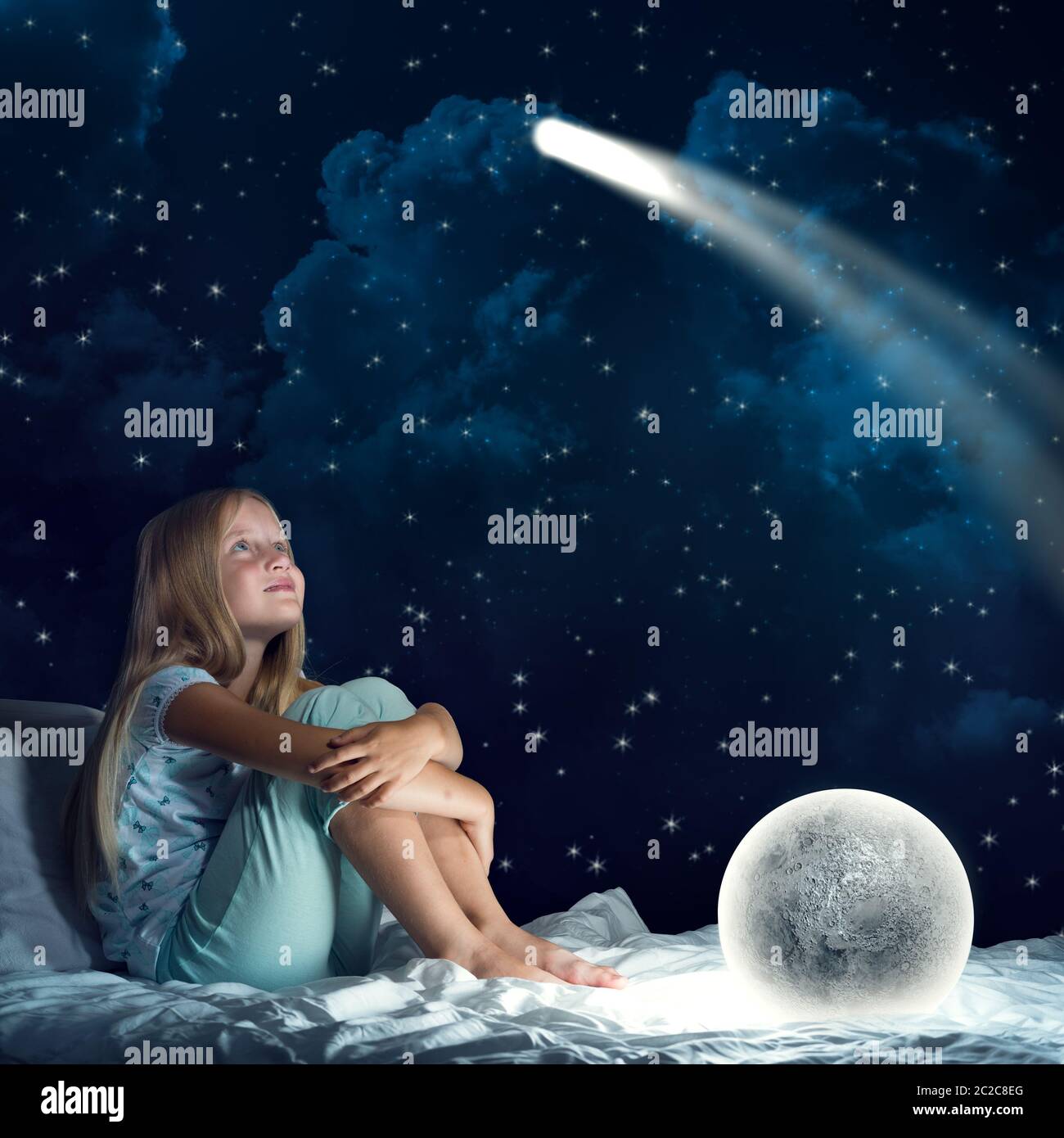 Girl in her bed and moon planet Stock Photo - Alamy
