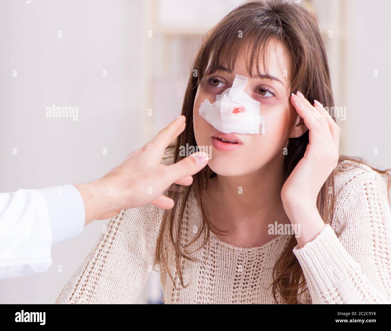 Male doctor talking to patient with nose operation surgery Stock Photo ...
