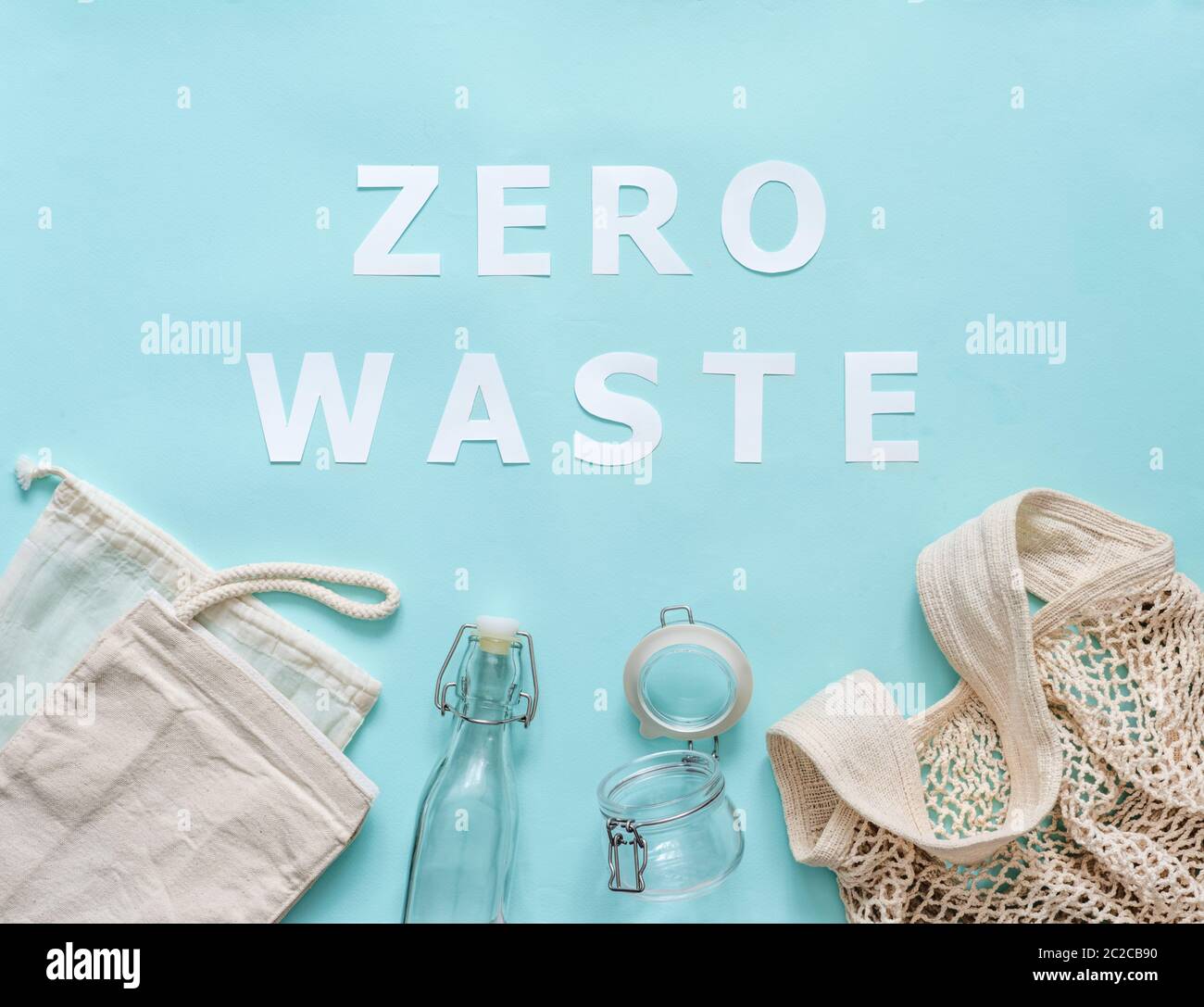 Zero waste paper text and eco bags, glass jars Stock Photo - Alamy