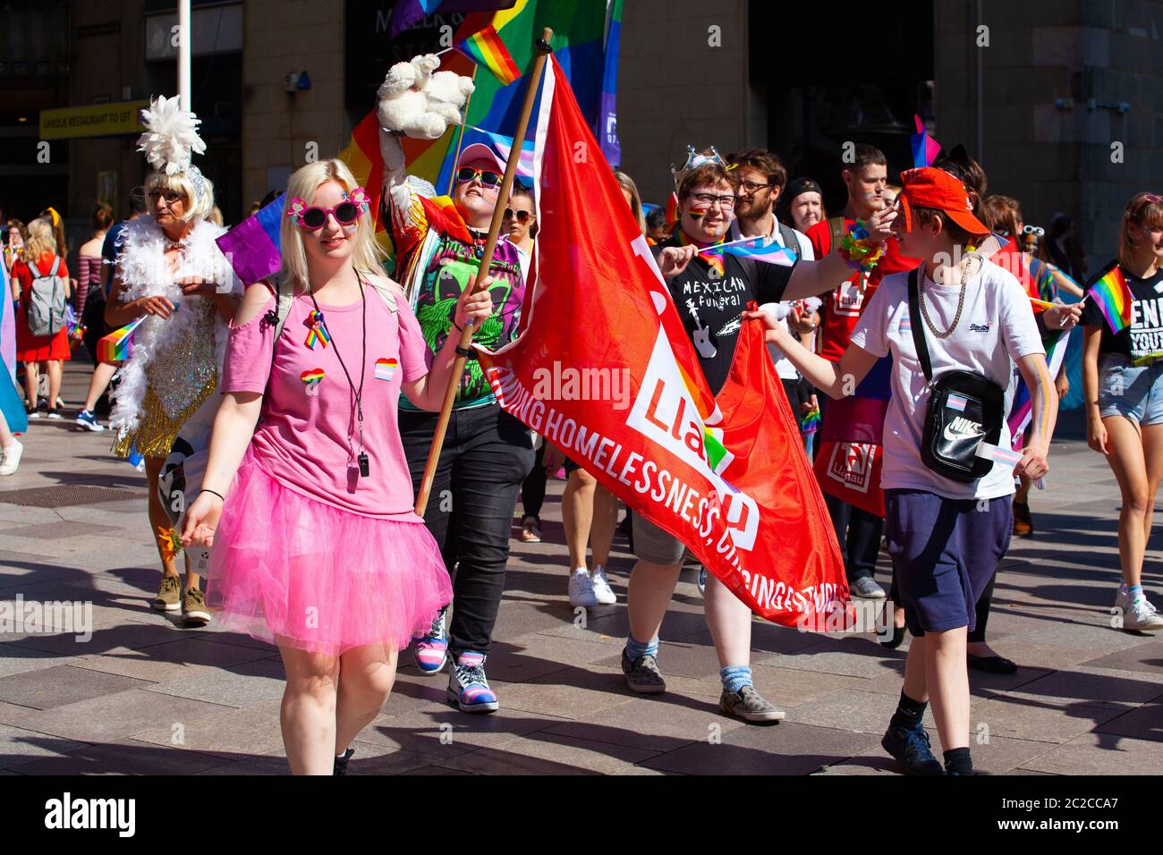Pride Cymru / Gay pride marchers supporting Llamau, a homeless charity ...