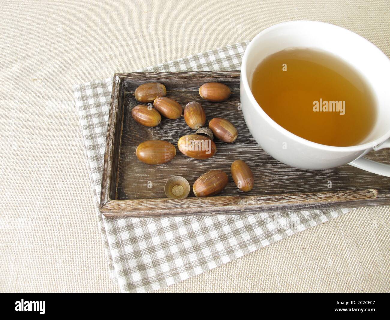 Acorn coffee from roasted acorns on a tray Stock Photo - Alamy