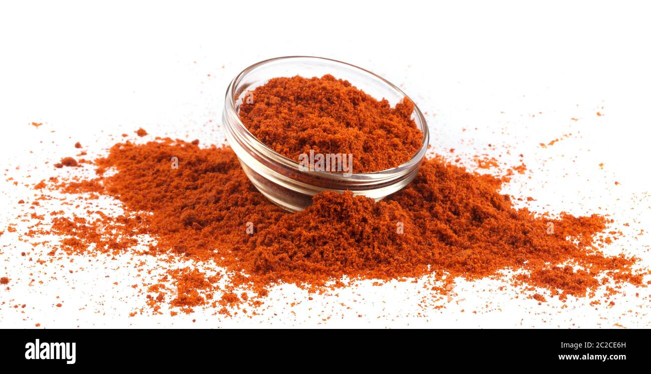 Red paprika powder isolated on white background Stock Photo - Alamy