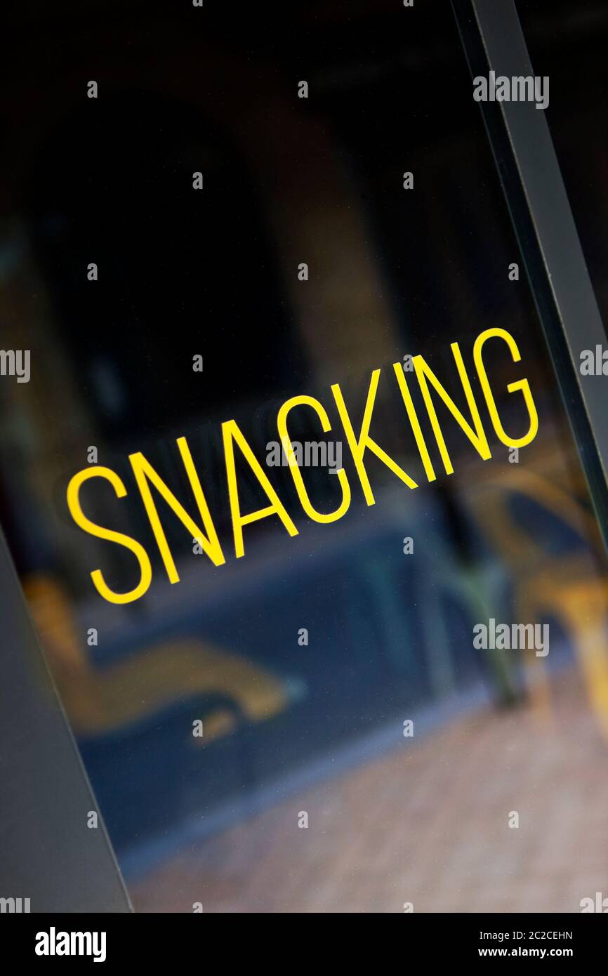 Sign on the window of a snack bar in the city Stock Photo - Alamy