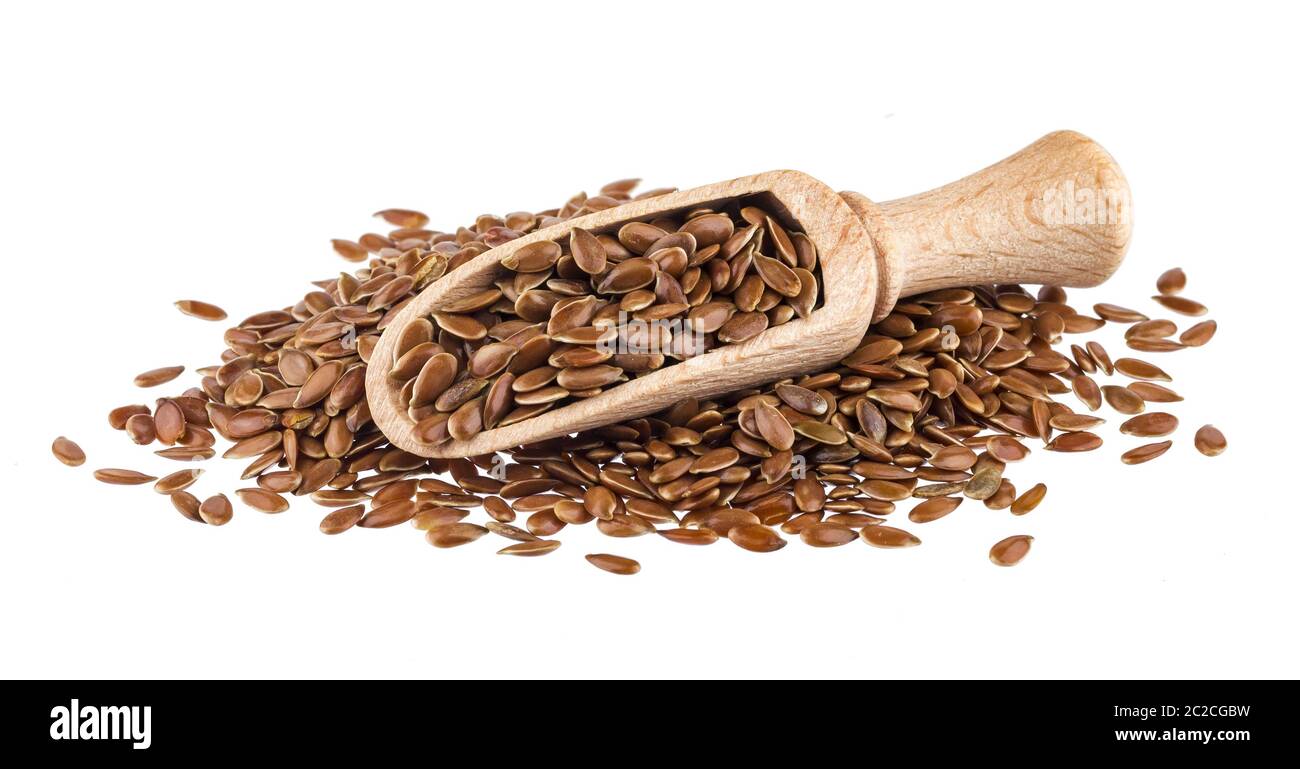 Flax seeds isolated on white background, close-up of flaxseed in wooden scoop Stock Photo - Alamy