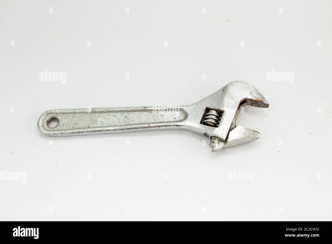 adjustable spanner on white background Stock Photo - Alamy