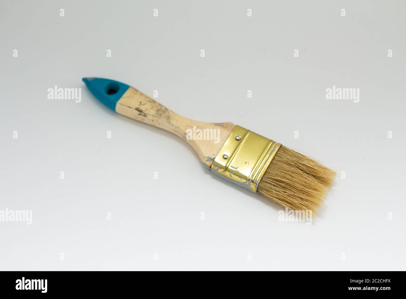 a painter brush on a white background Stock Photo - Alamy