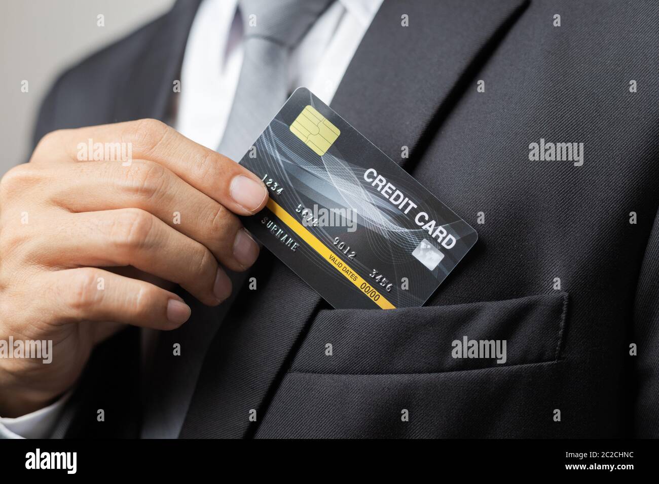 Business person take credit card hi-res stock photography and images ...