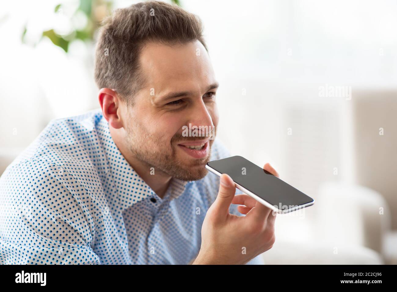 Man using voice recognition hi-res stock photography and images - Alamy