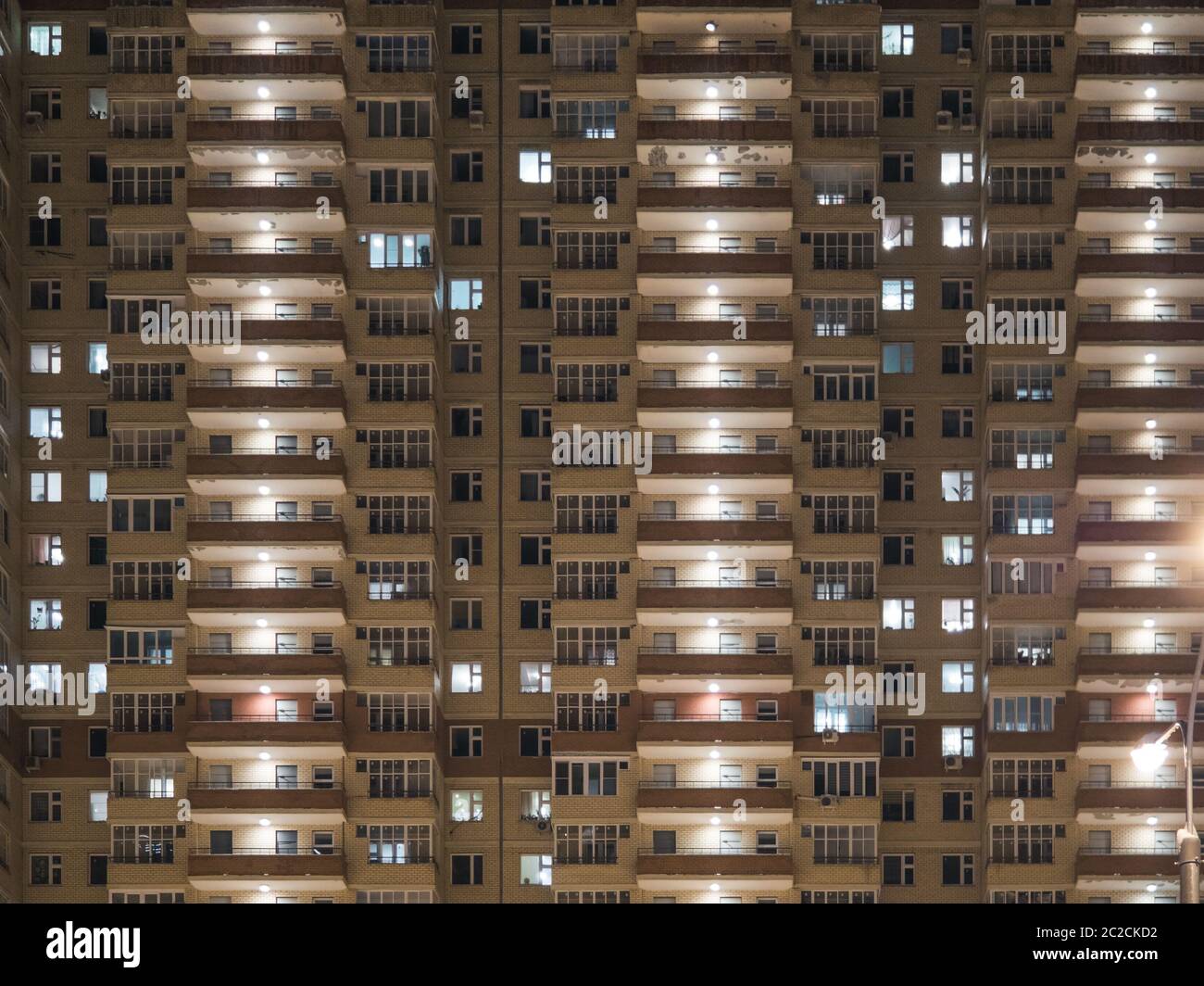 Apartment building in night Stock Photo - Alamy