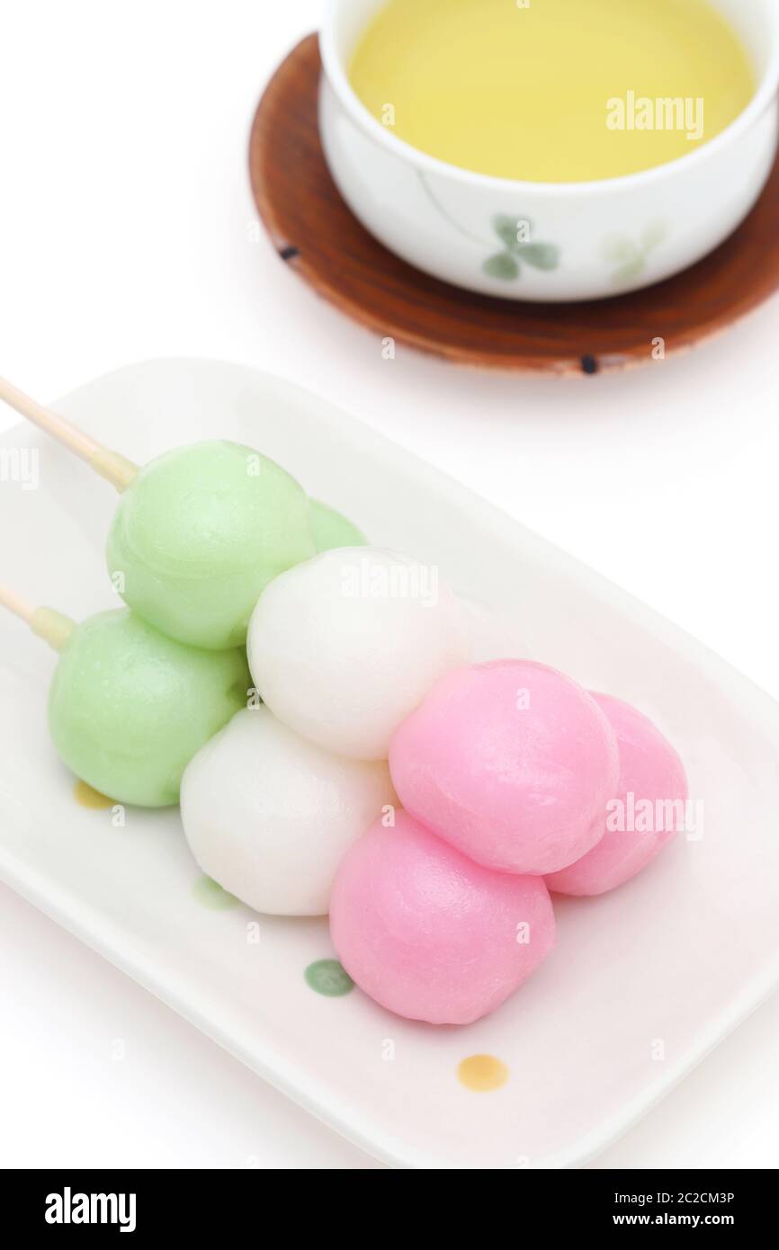 Japanese traditional confectionery Sanshoku Dango on white background ...
