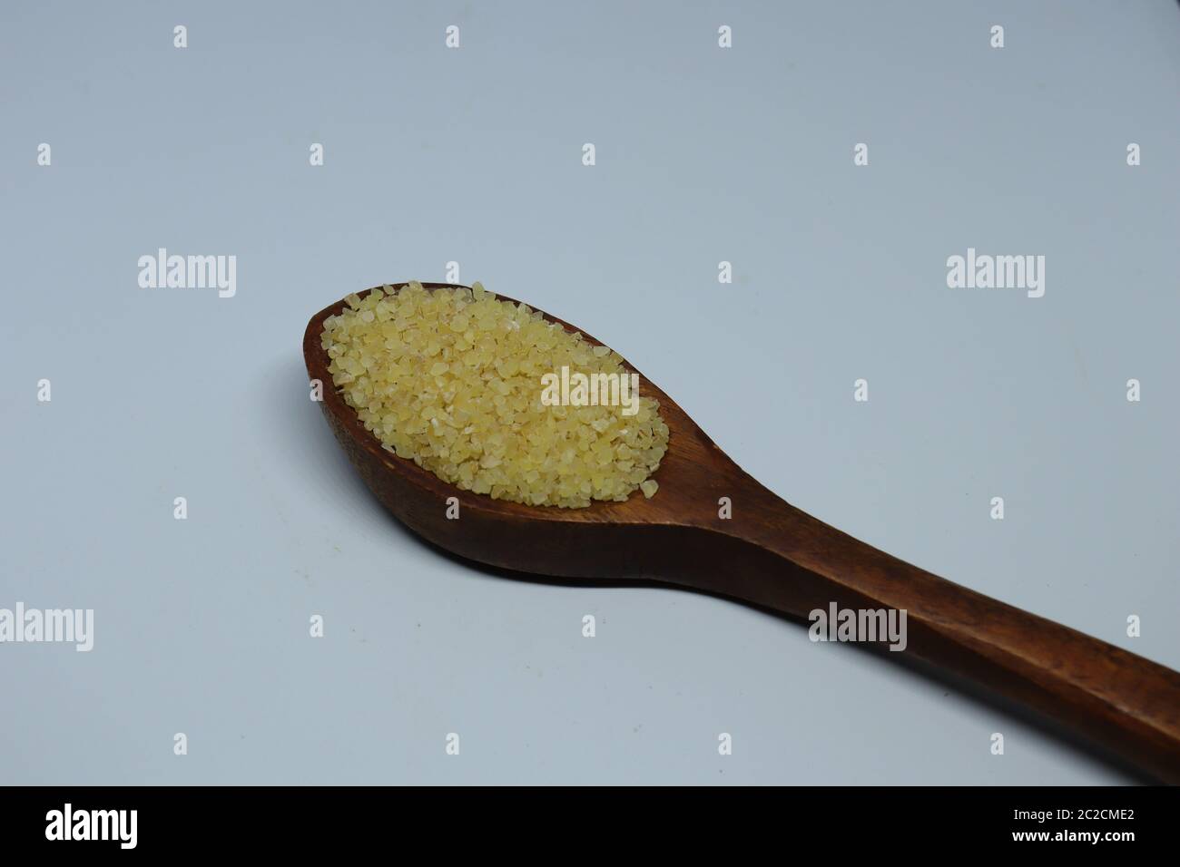 Raw Semolina flour or Rava powder isolated in white background Stock ...