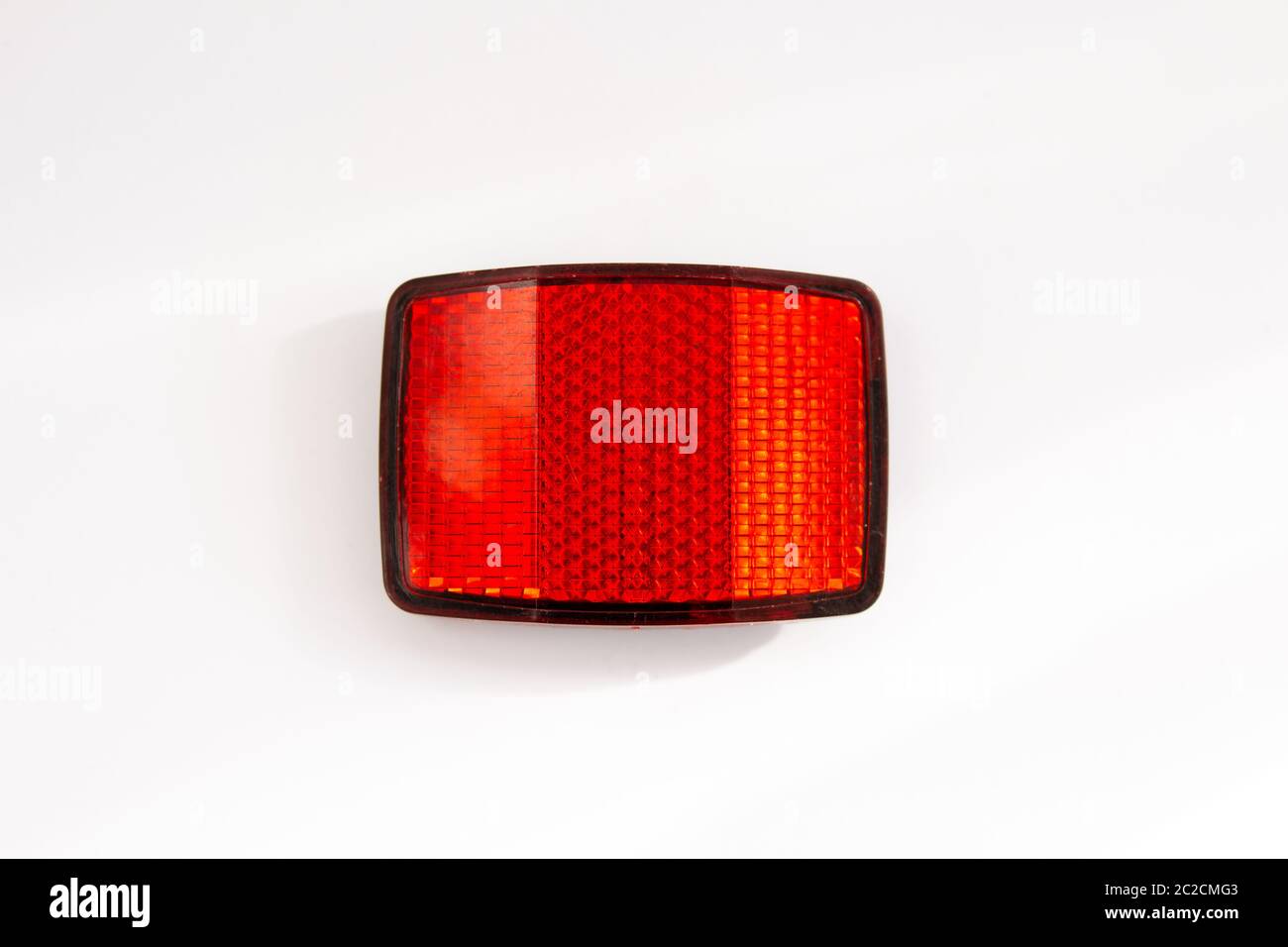 red reflective bicycle on a white background Stock Photo - Alamy