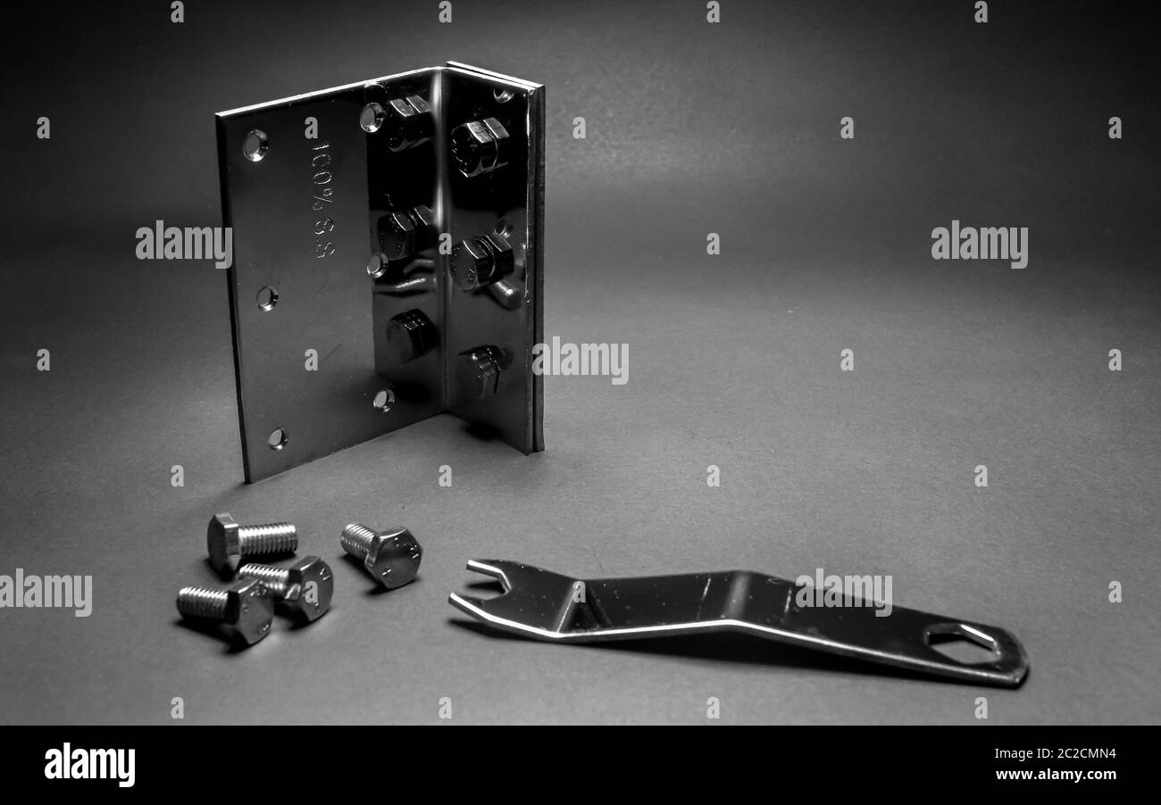 Heavy stainless still bed joint clamps Stock Photo - Alamy