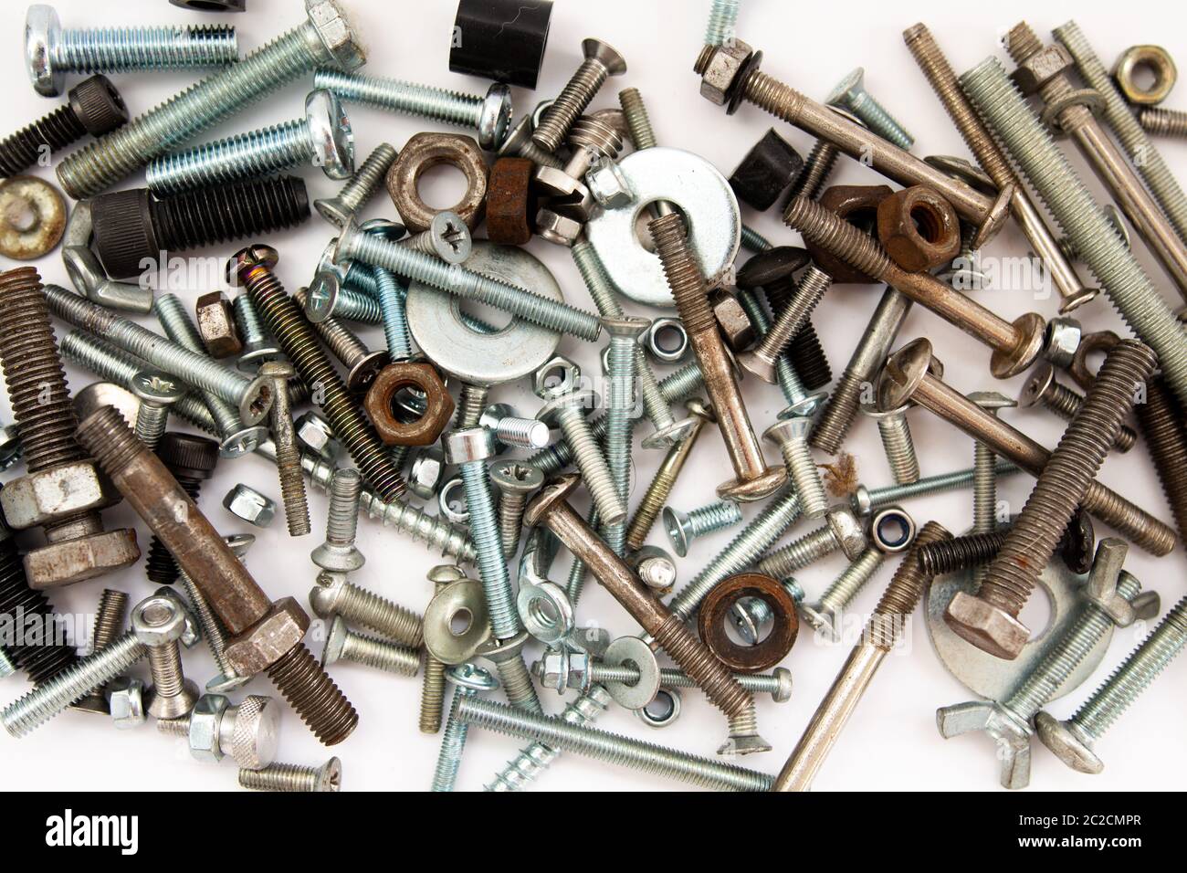 screws bolts and screws on white background Stock Photo - Alamy