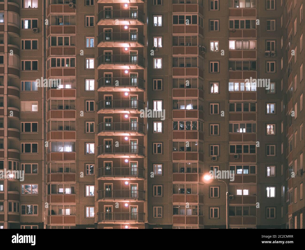 Apartment building in night Stock Photo - Alamy